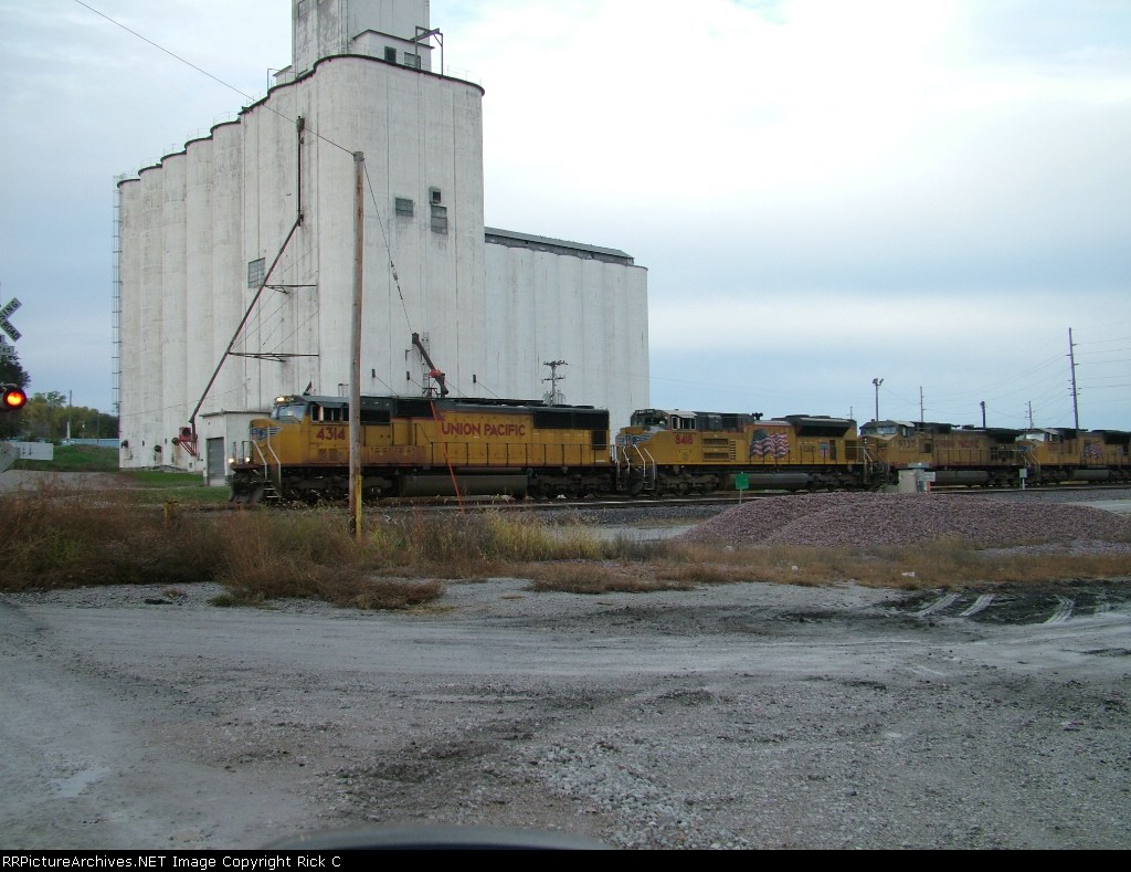 UP 4314 Leads 3 Other Units WB With Stacks